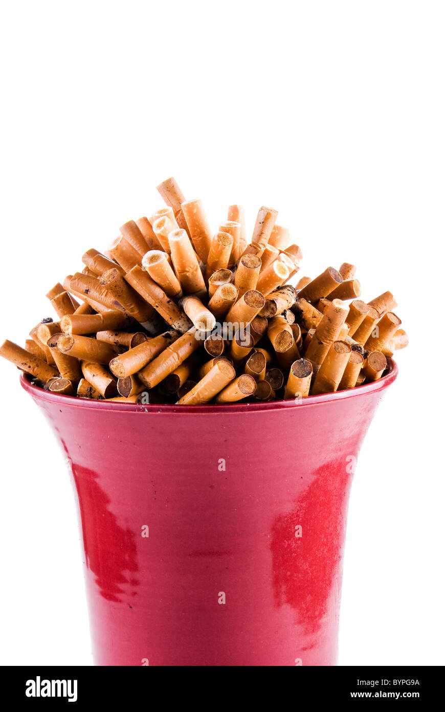 Full bowl of cigarettes end over white background Stock Photo - Alamy