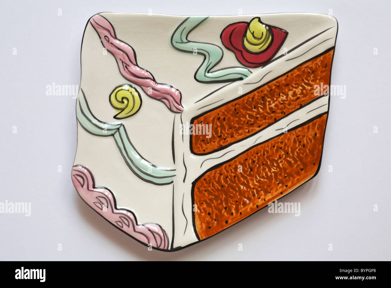 Pretty decorative cake shaped plate on isolated white background Stock ...