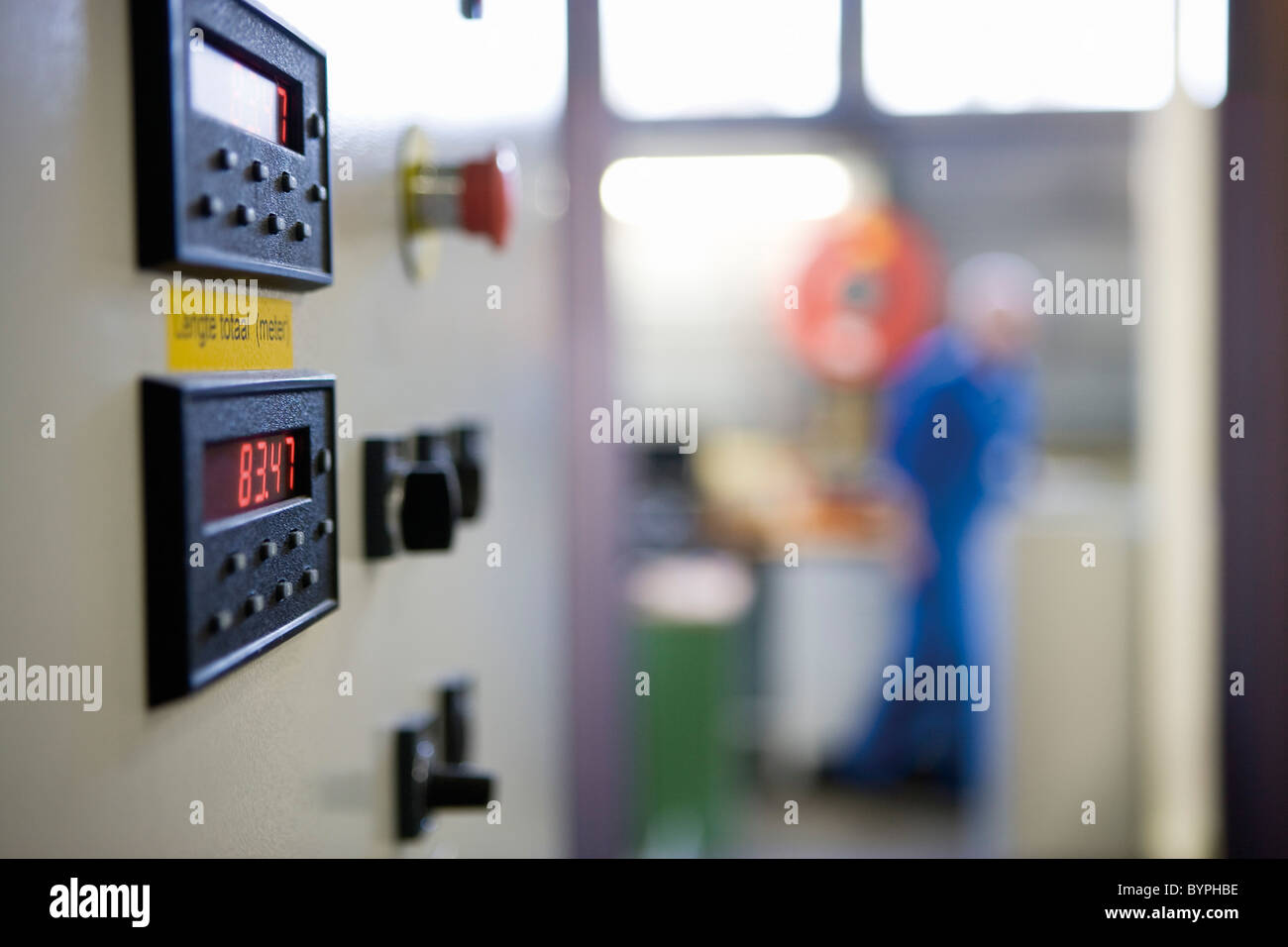 Close-up of control panel on weaving machine in carpet tile factory ...