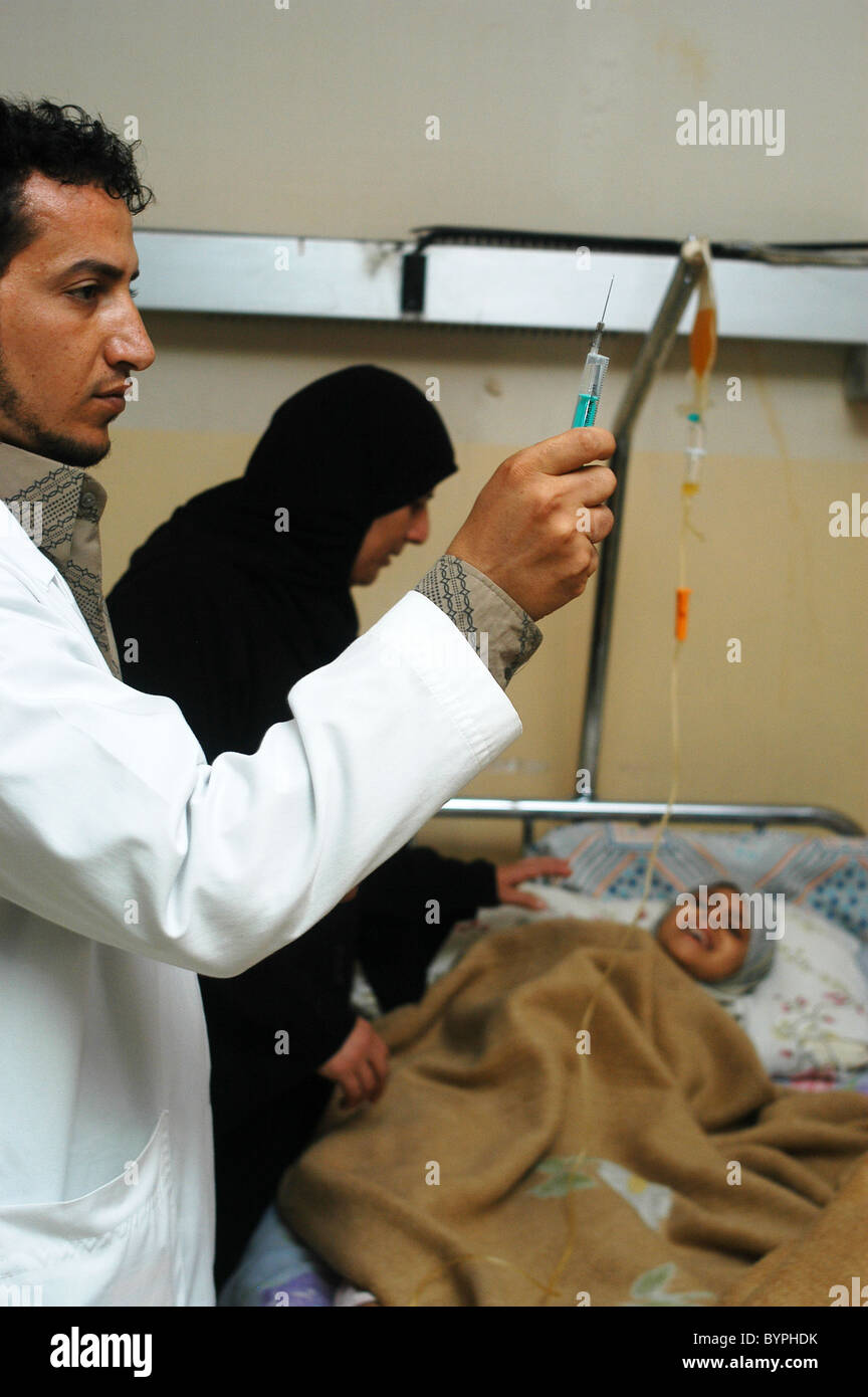 Basra hospital. Doctor treating child with leukemia, possible caused by ...