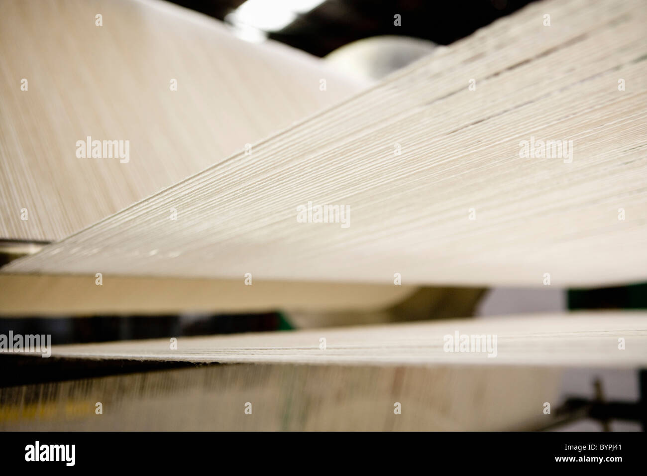 Carpet weaving loom in carpet tile factory Stock Photo - Alamy
