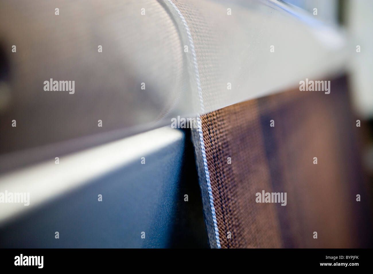 Loom weaving carpet in carpet tile factory Stock Photo - Alamy