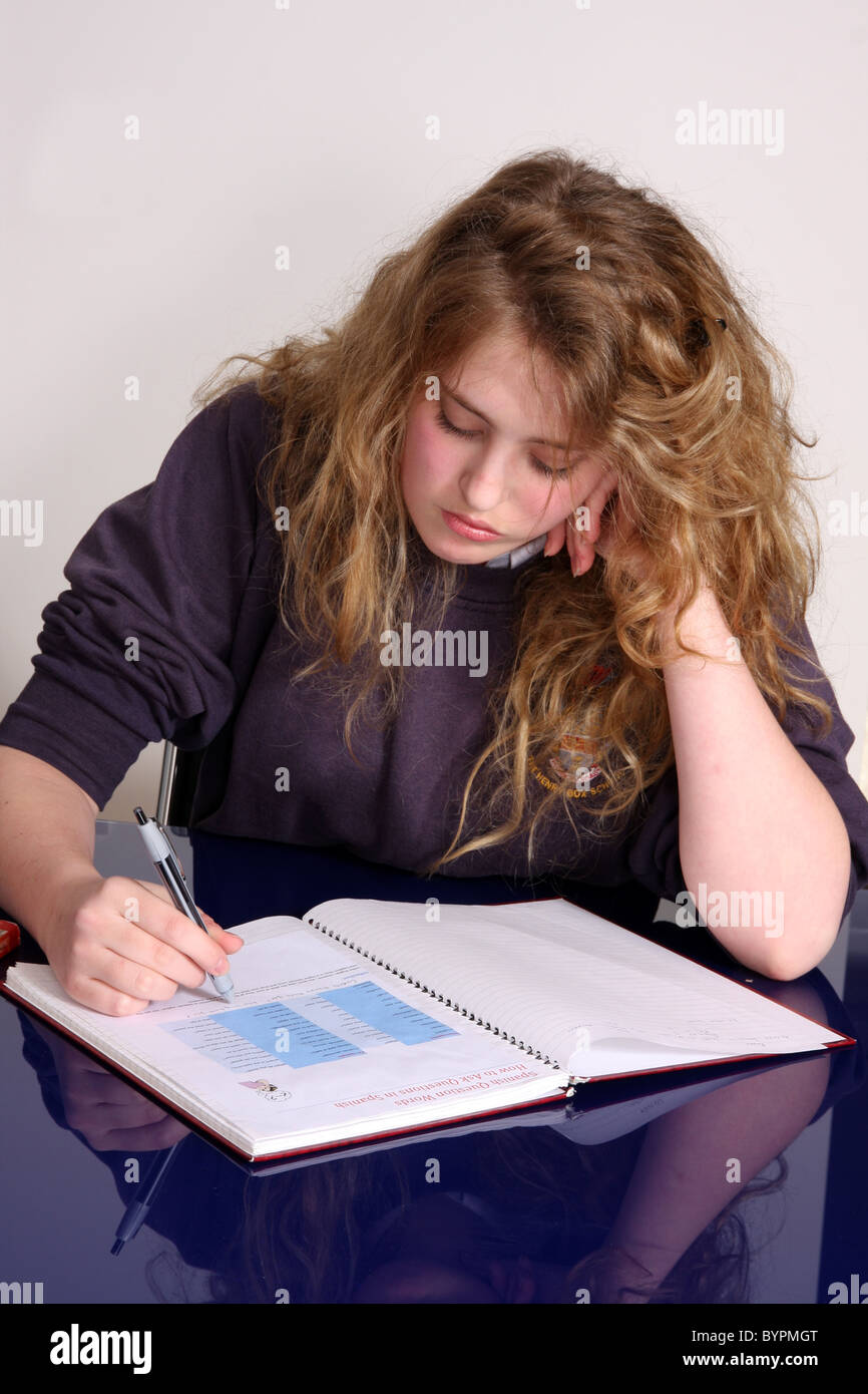 A school girl doing school work Stock Photo - Alamy