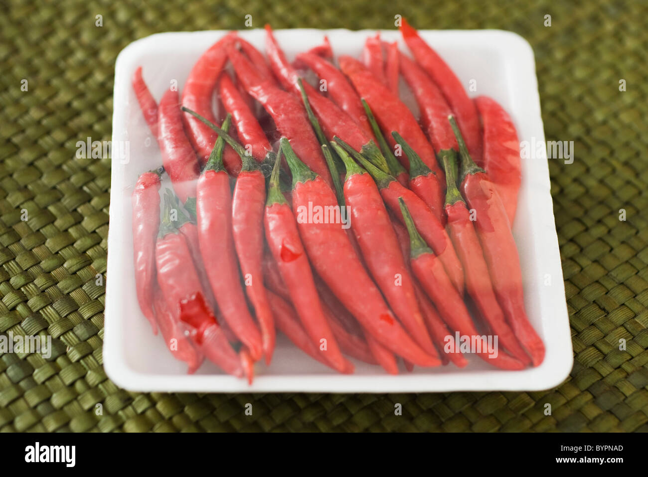 Fresh red chili peppers Stock Photo - Alamy