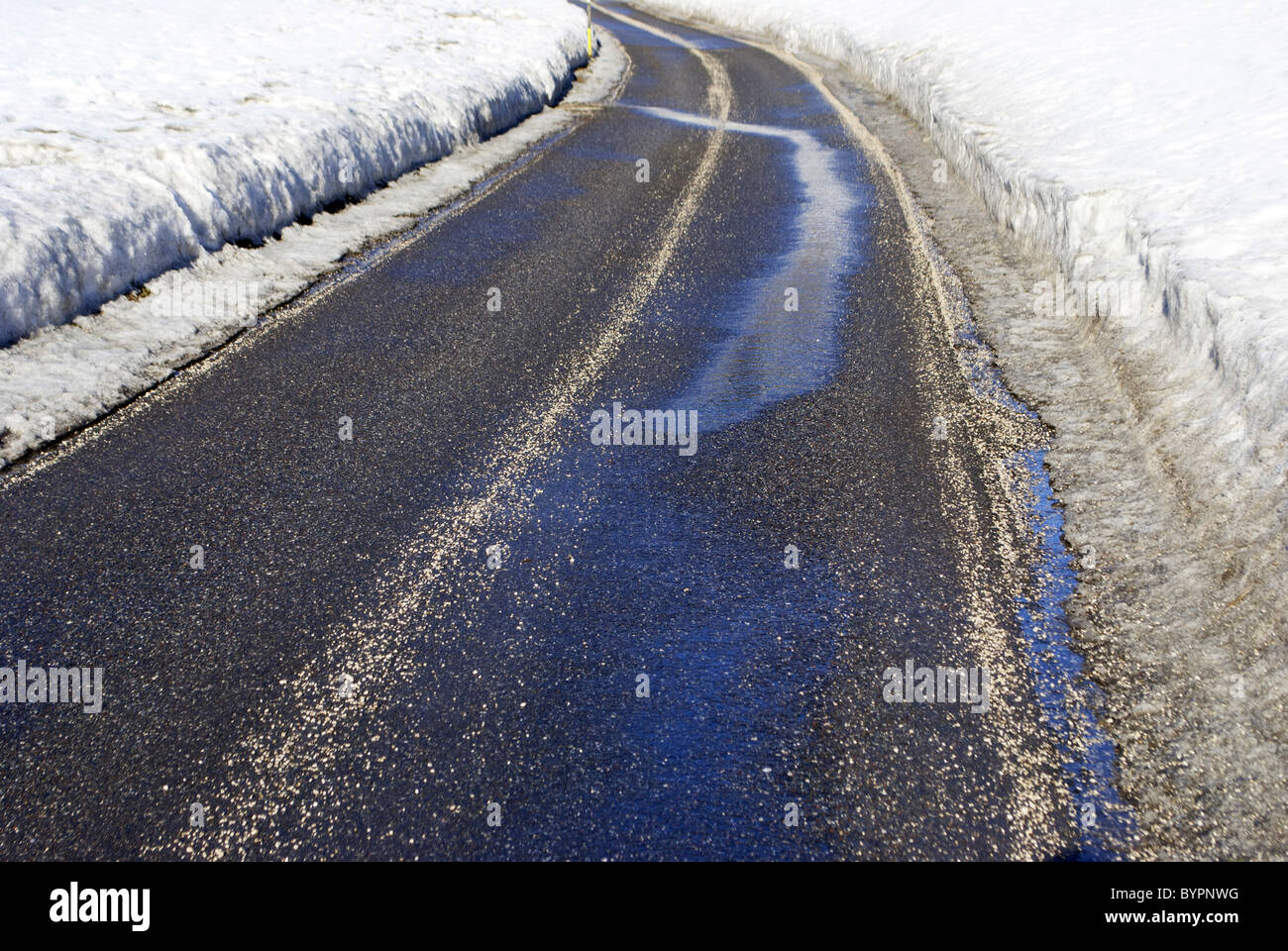paved road in winter with snow Stock Photo - Alamy