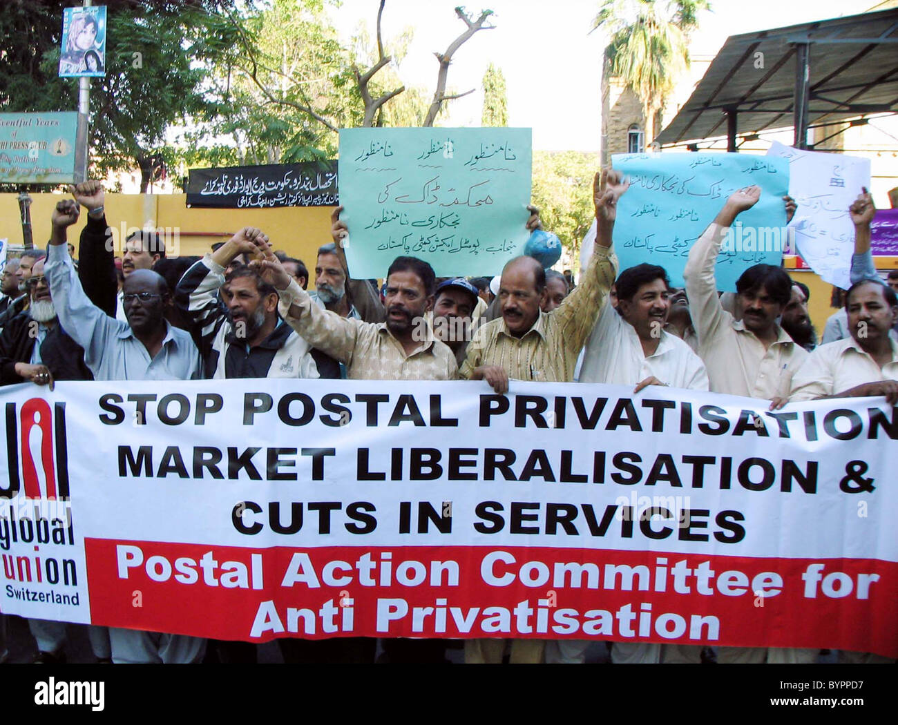 Supporters of Postal Action Committee chant slogans against ...