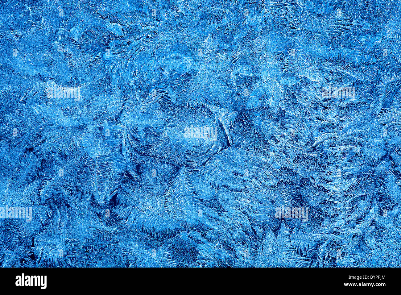 Frost patterns on window glass in winter Stock Photo - Alamy
