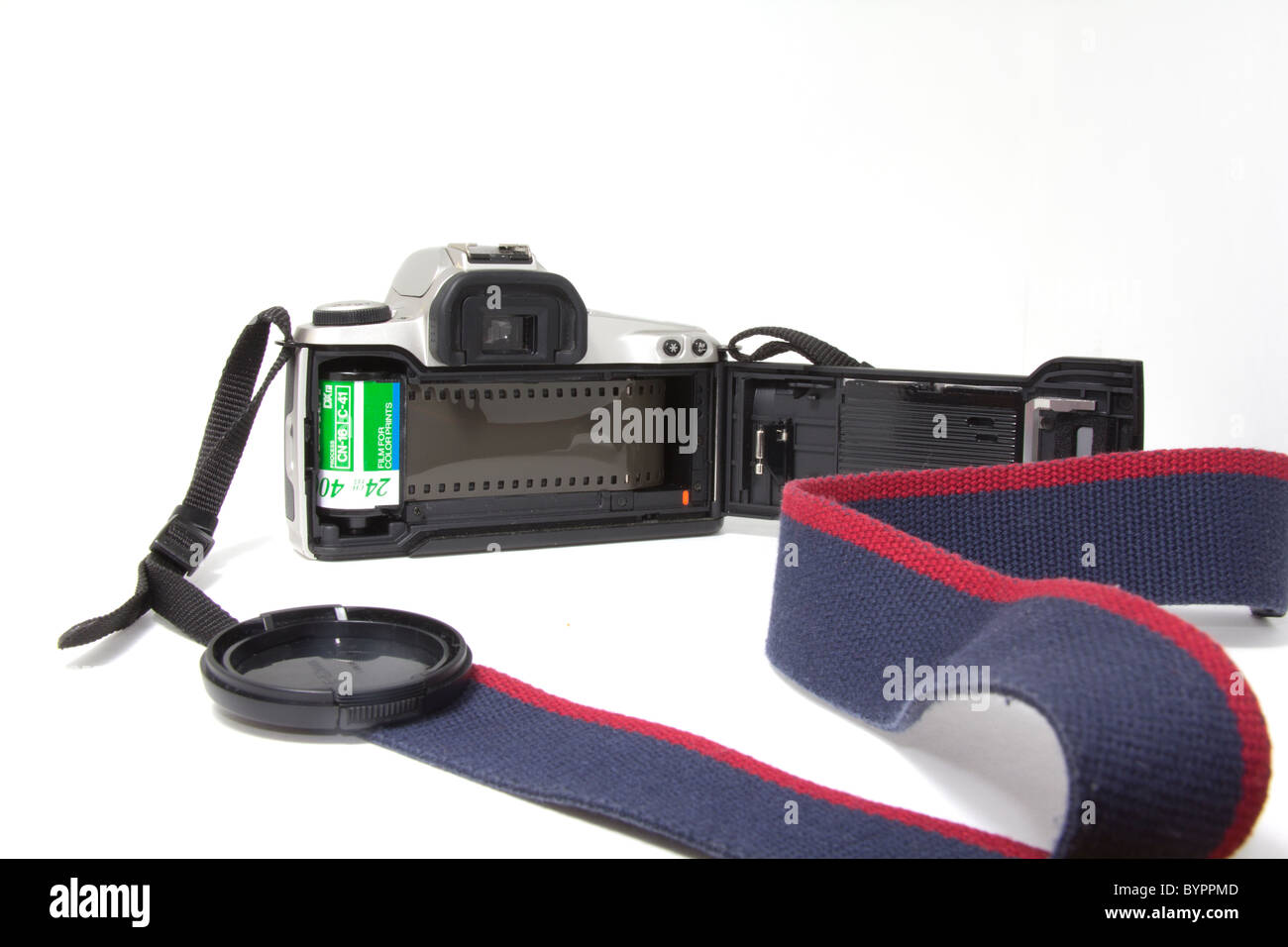 A 35mm SLR camera open from the back and showing the loaded film Stock ...