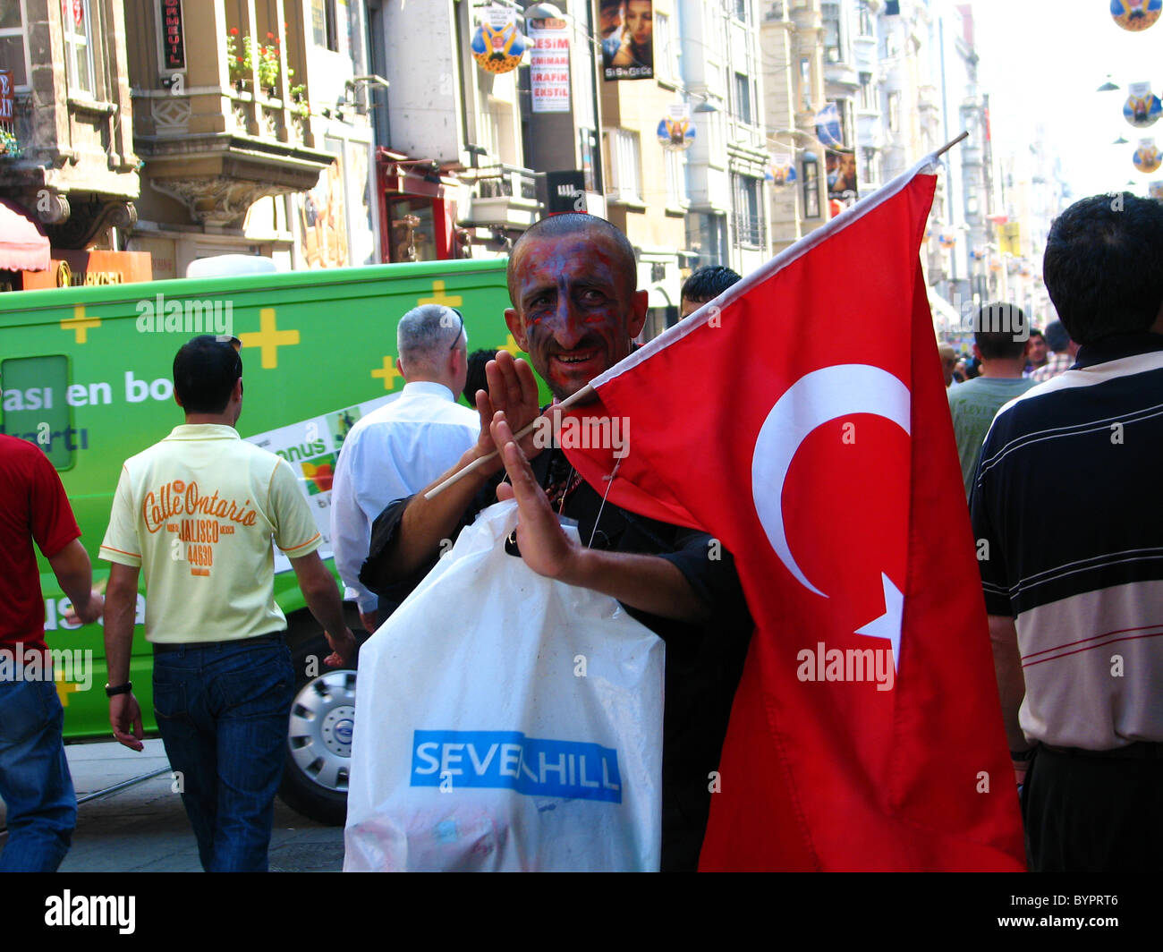 Homeless man holding Turkish flag in Istanbul, Turkey 2007 Stock Photo ...