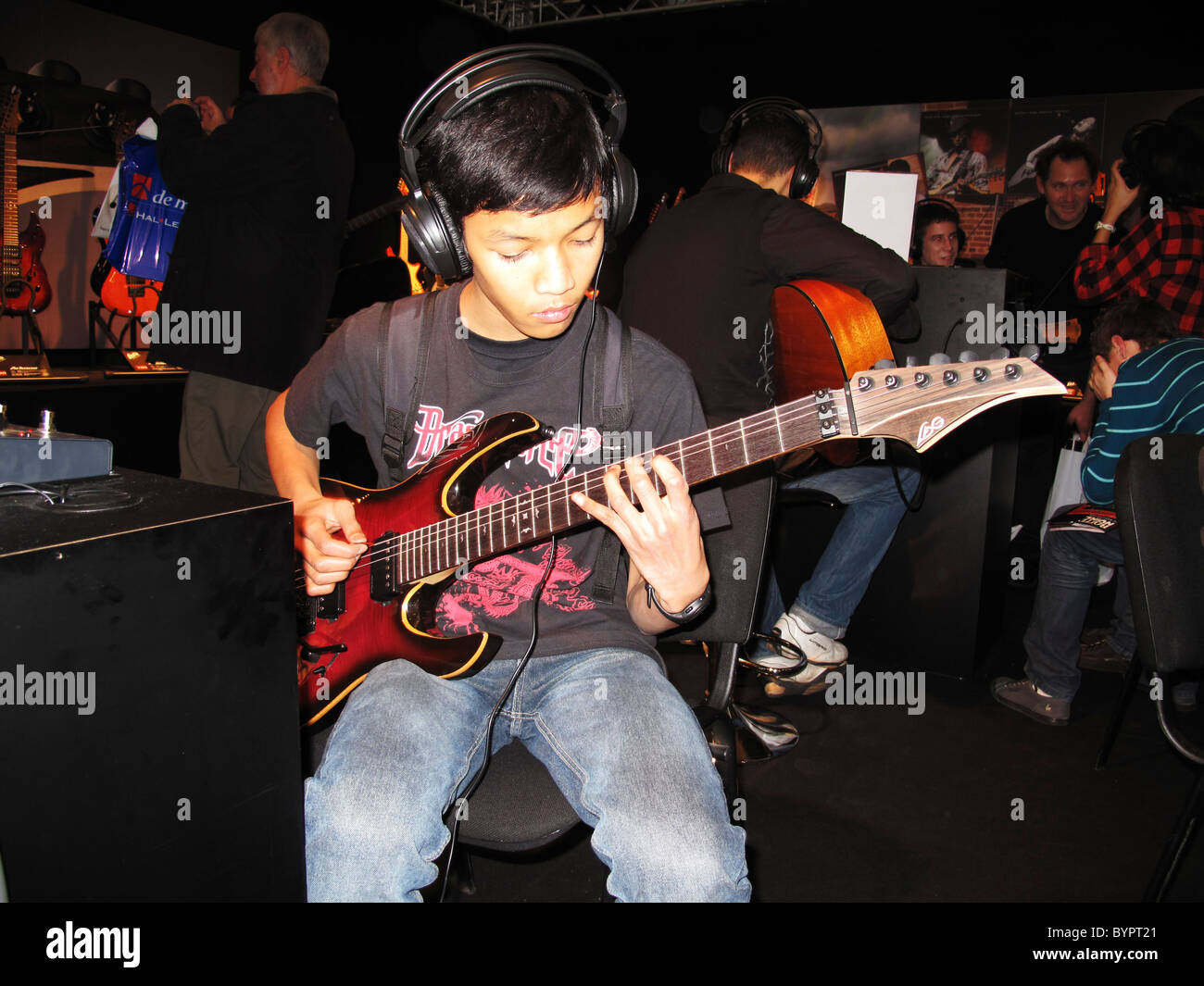 boy play with LAG electric guitar,The Music Show,Music and Me,Paris ...
