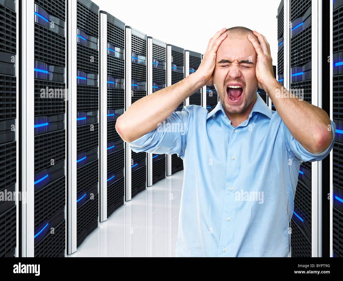 stressed man and datacenter with lots of server Stock Photo - Alamy