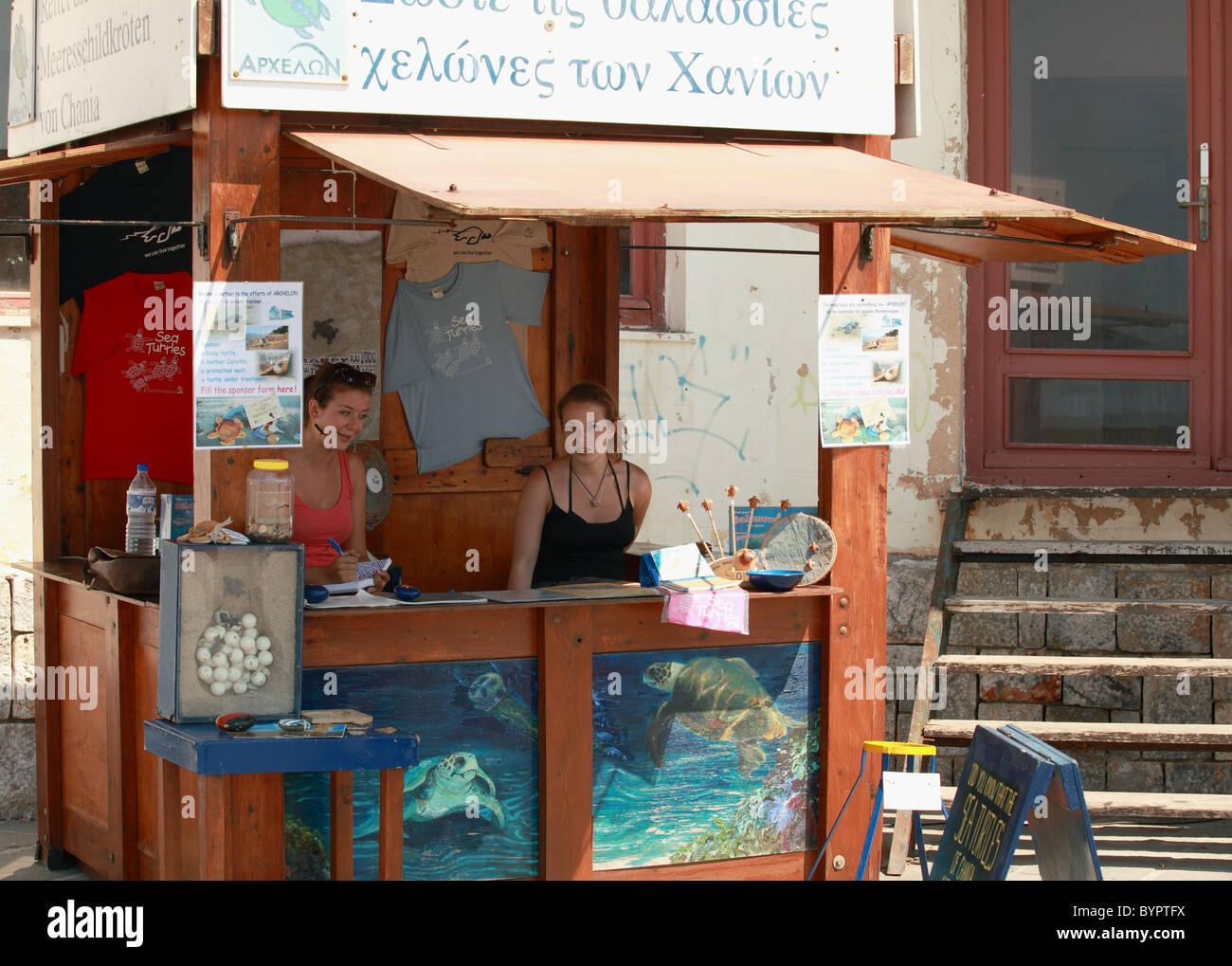 Volunteers staff the Chania kiosk raising awareness for the Greek sea ...