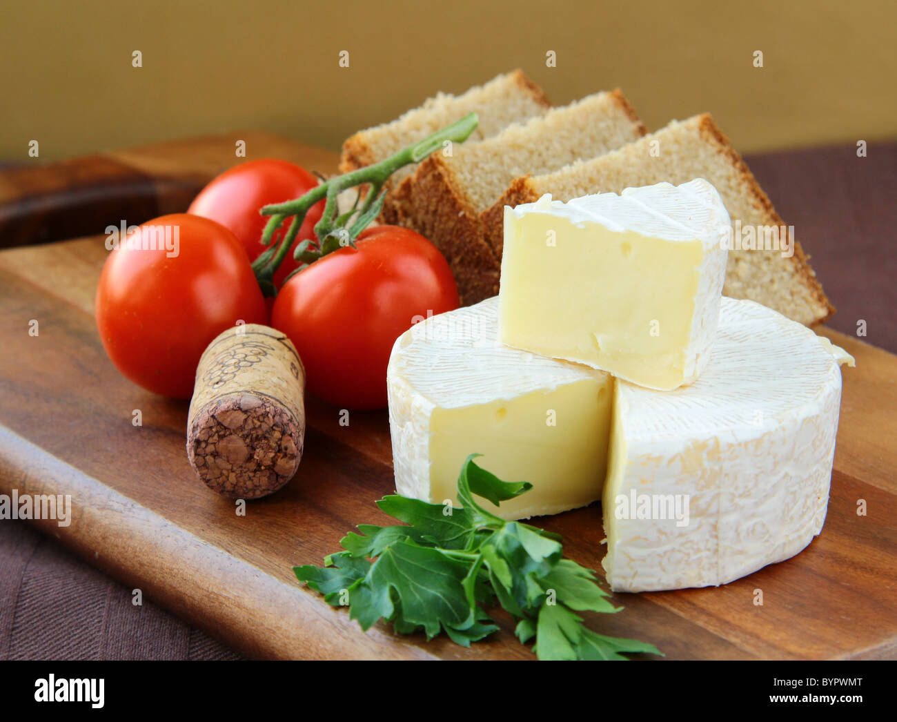 delicatessen soft cheese with bread, tomatoes picnic concept Stock ...