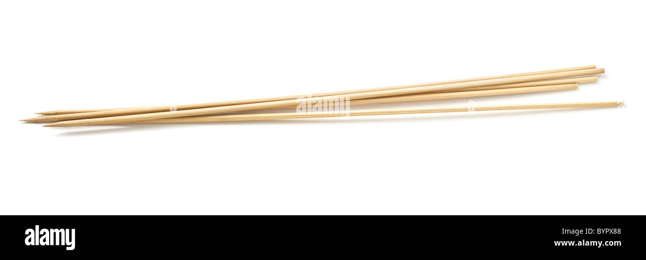 Wooden bamboo kebab Skewers from low perspective isolated on white ...