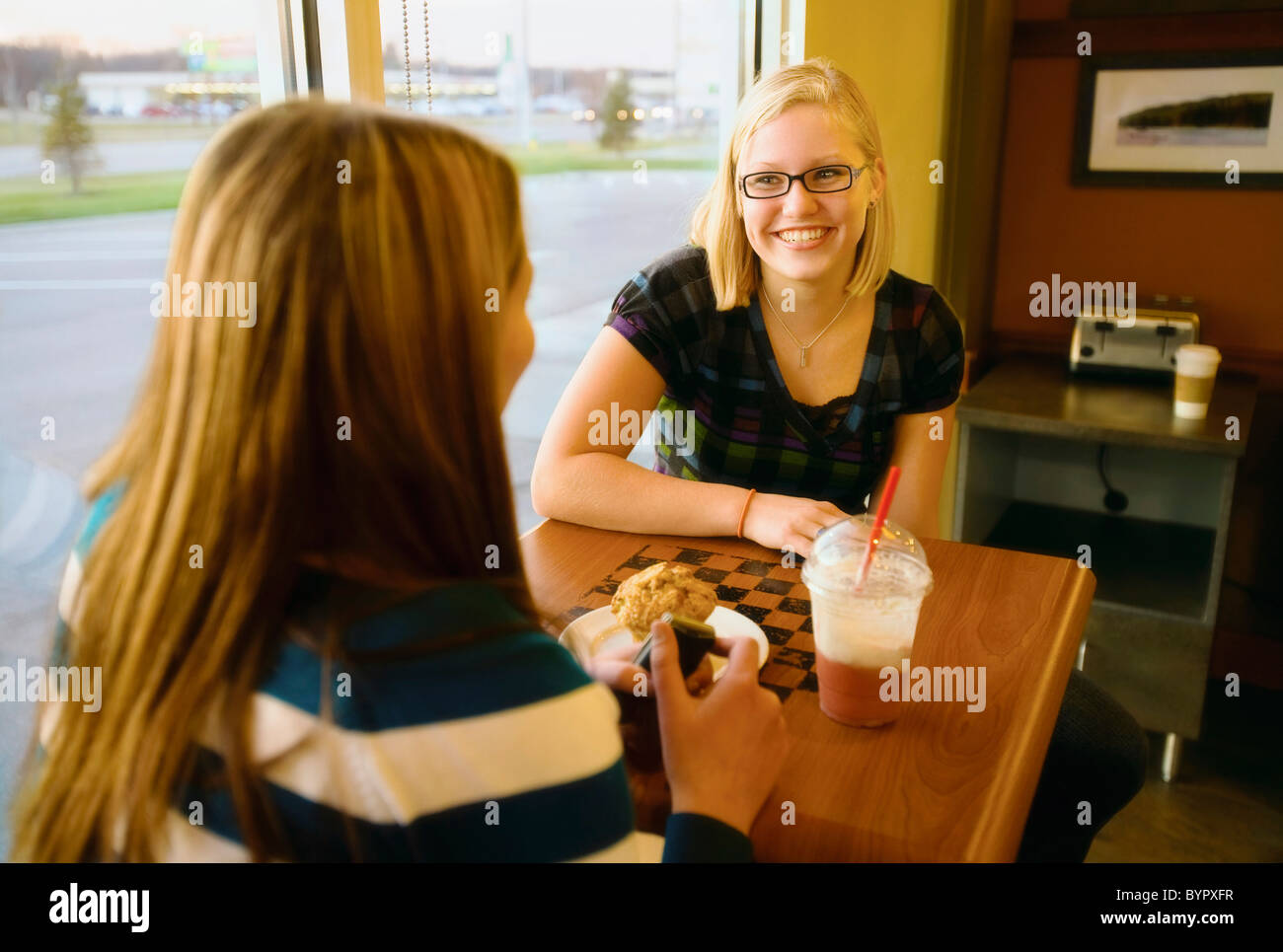 Talking behind back hi-res stock photography and images - Alamy