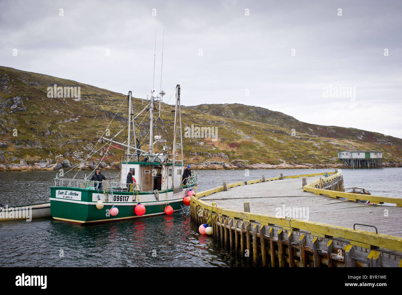 Fishing boat at Battle Harbour Labrador wharf Stock Photo - Alamy