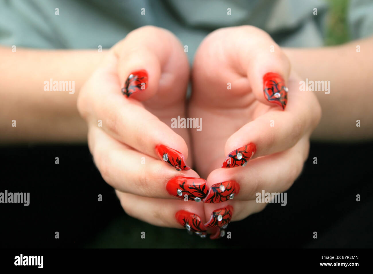 Open hands with nail art fingers Stock Photo - Alamy