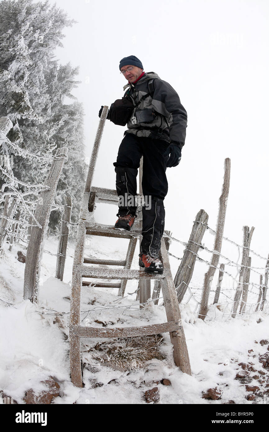 Man Climbing Over Stile High Resolution Stock Photography and Images ...