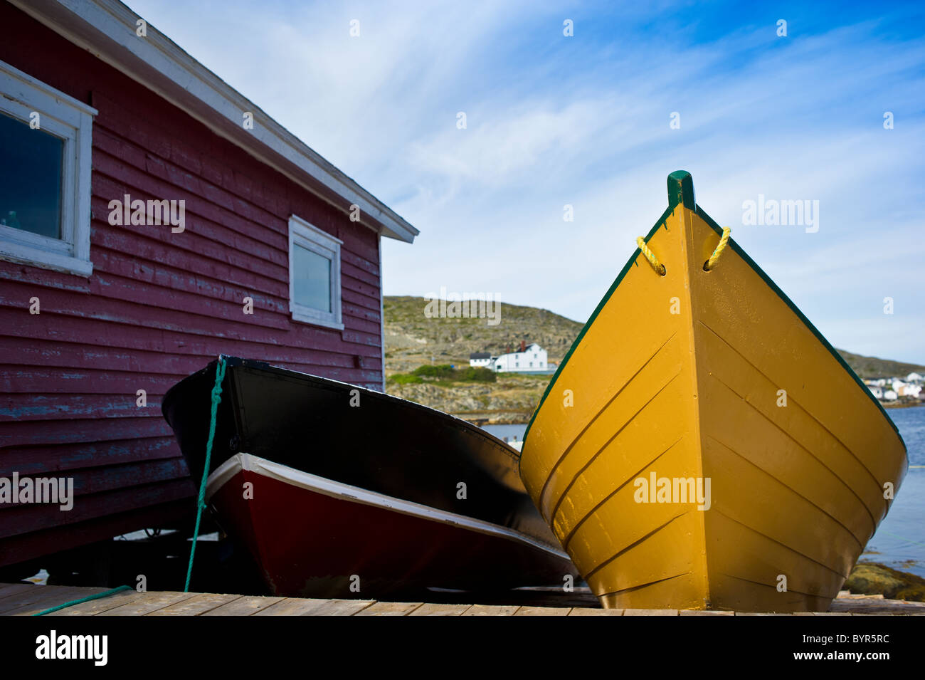 Yellow dory on dock slip hi-res stock photography and images - Alamy
