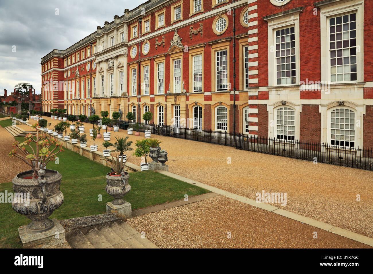 Sout side Hampton Court Palace leading to Gardens Stock Photo - Alamy
