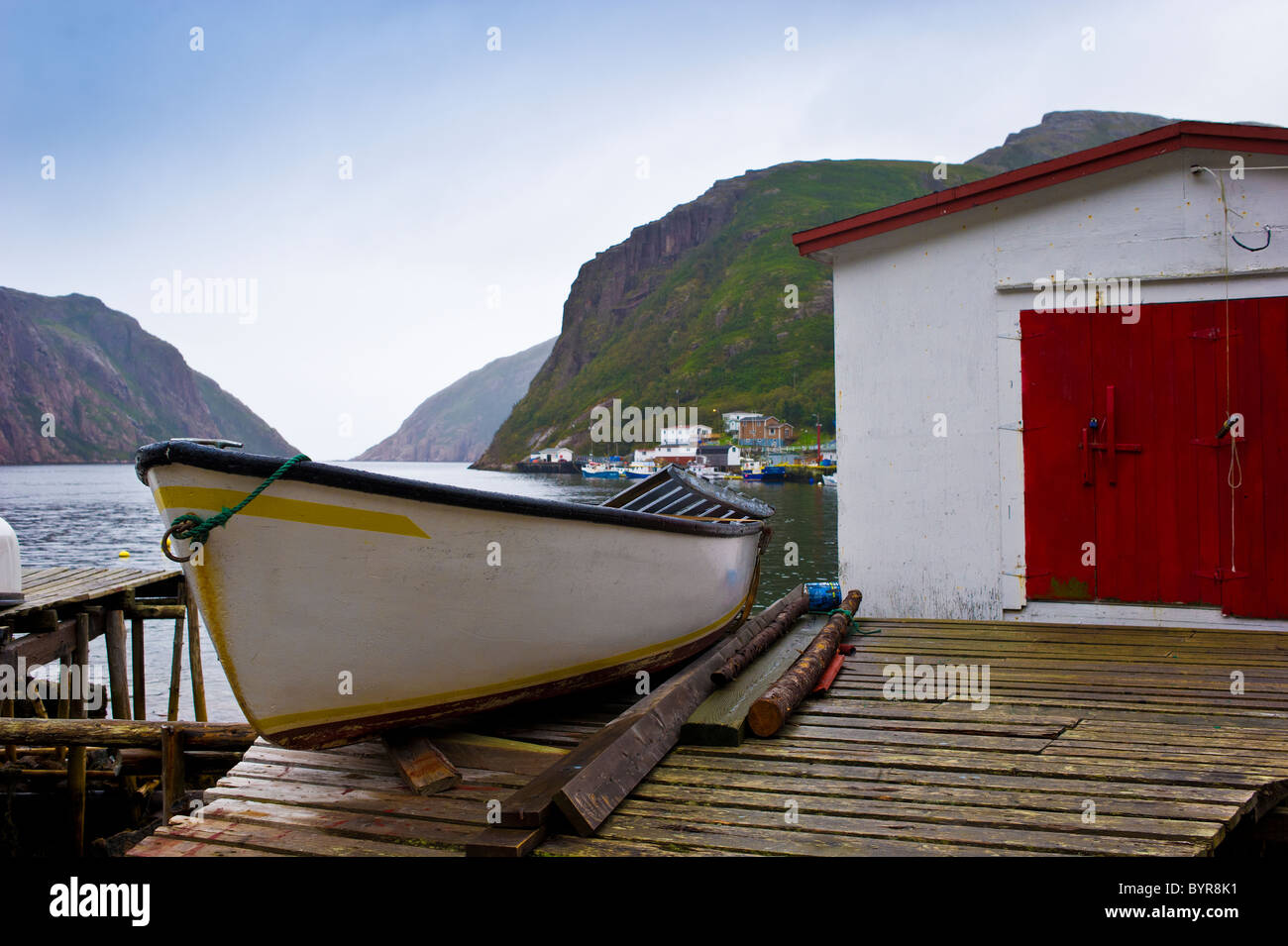 white dory in newfoundland outport Stock Photo - Alamy
