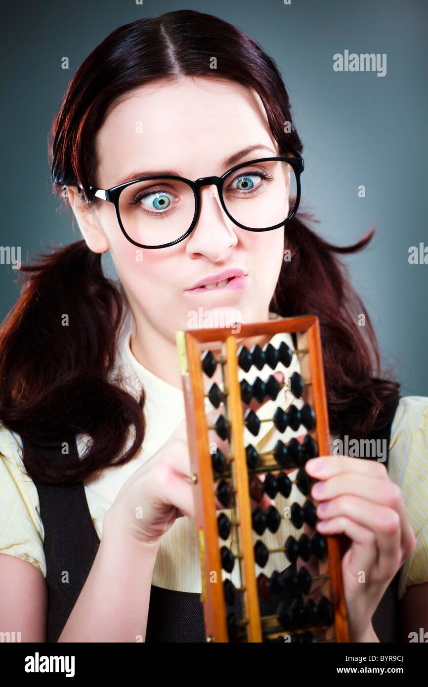 Woman using abacus hi-res stock photography and images - Alamy