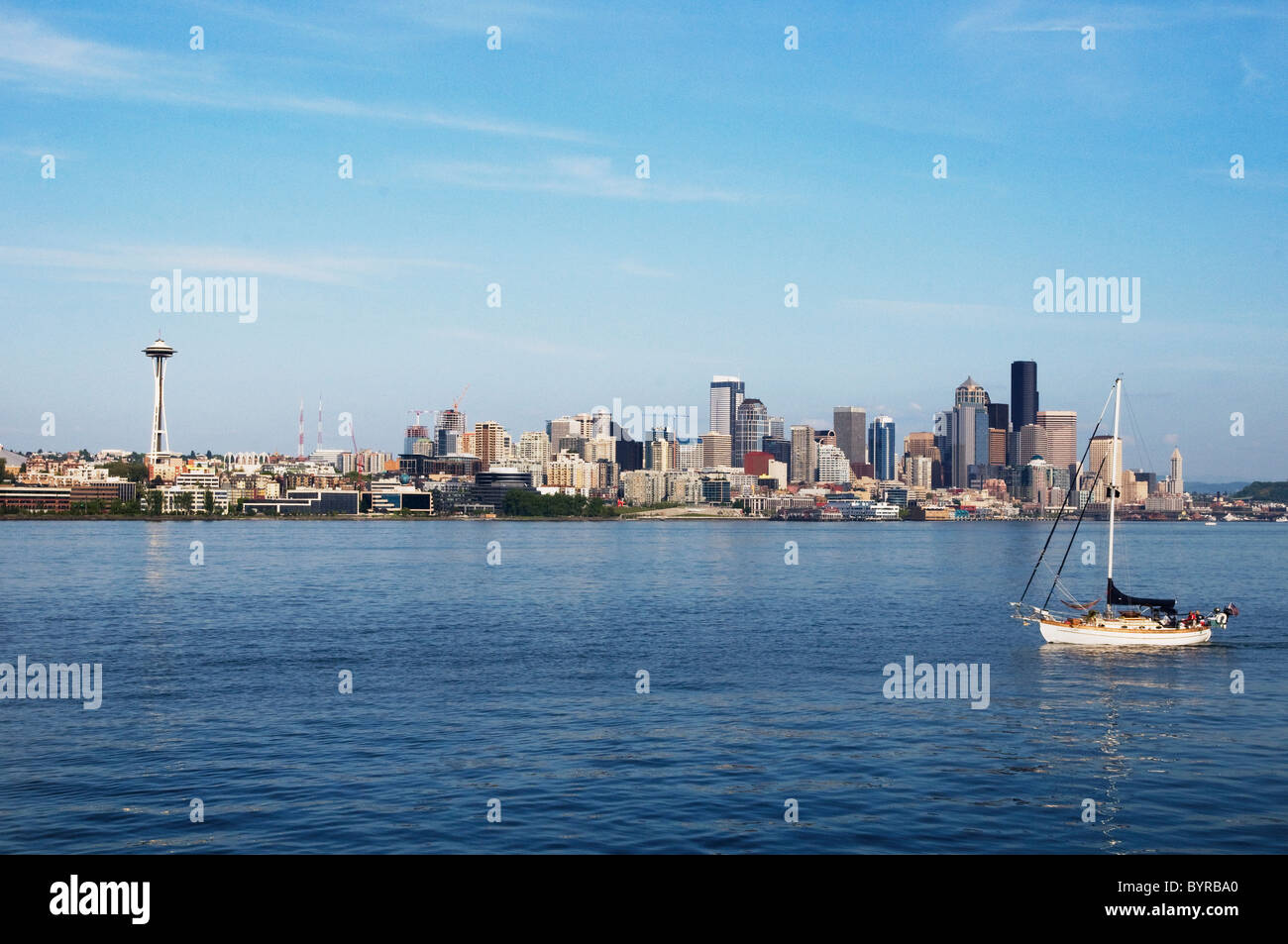 seattle skyline and a sailboat in the water; seattle, washington ...