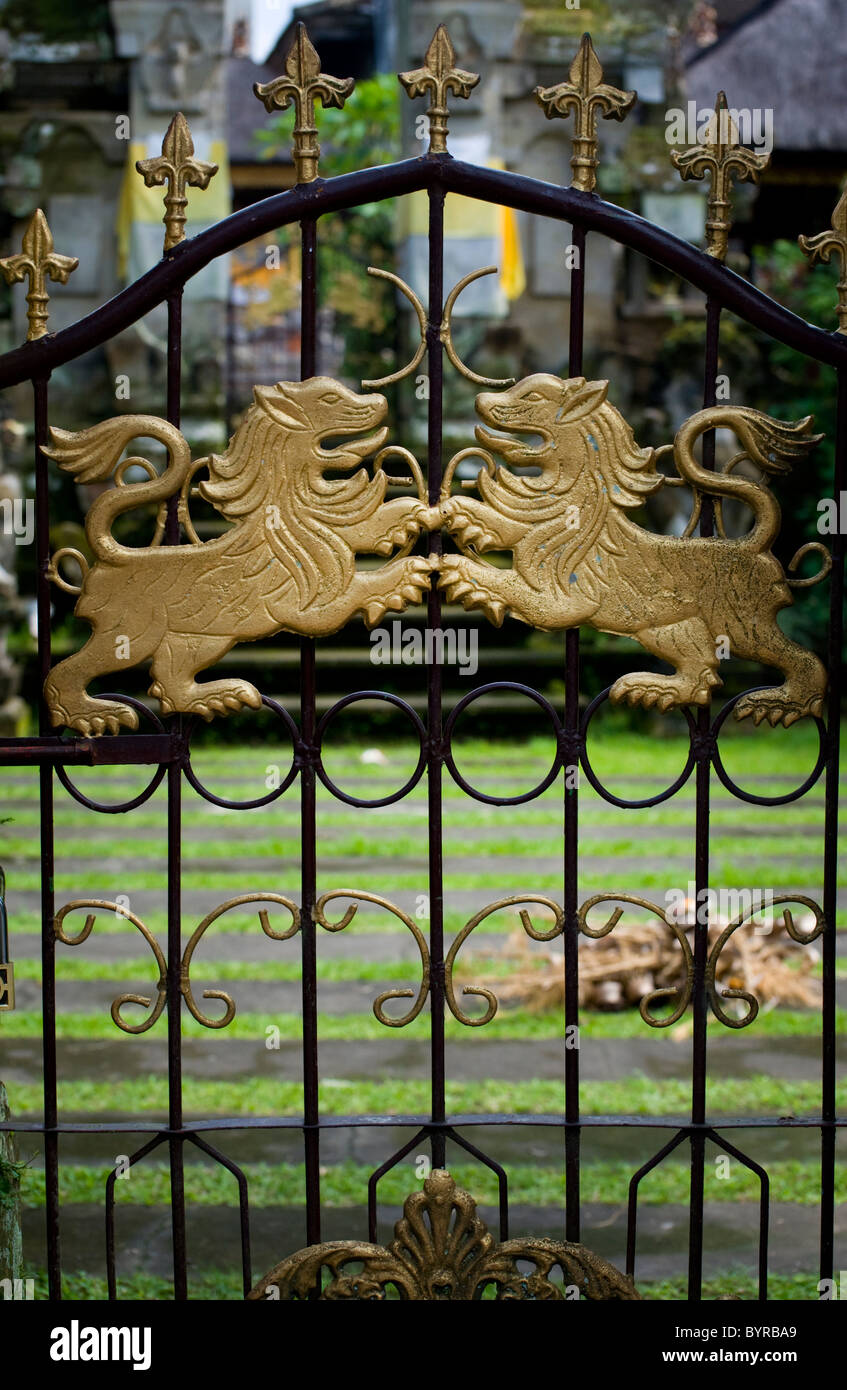 Ornate iron gate decorates the entrance to the temple in Ubud, Bali ...