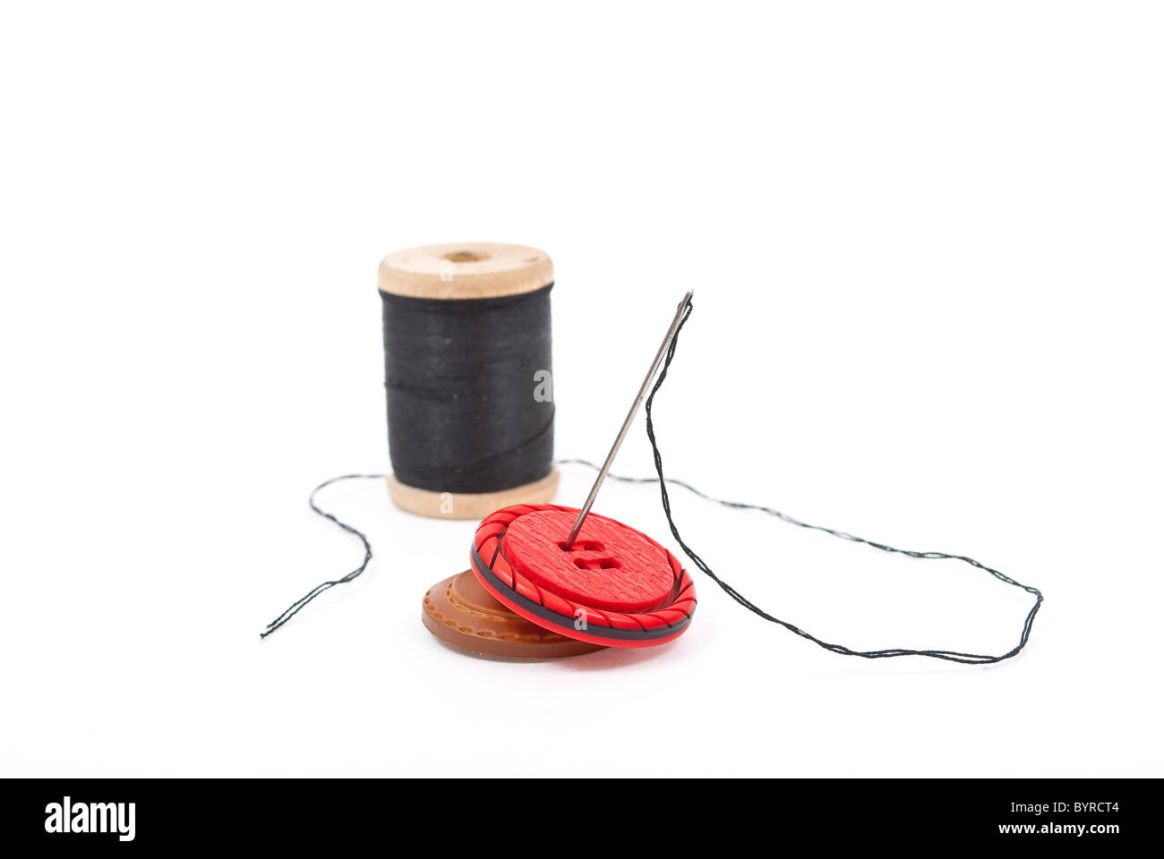 Needle and thread Stock Photo - Alamy