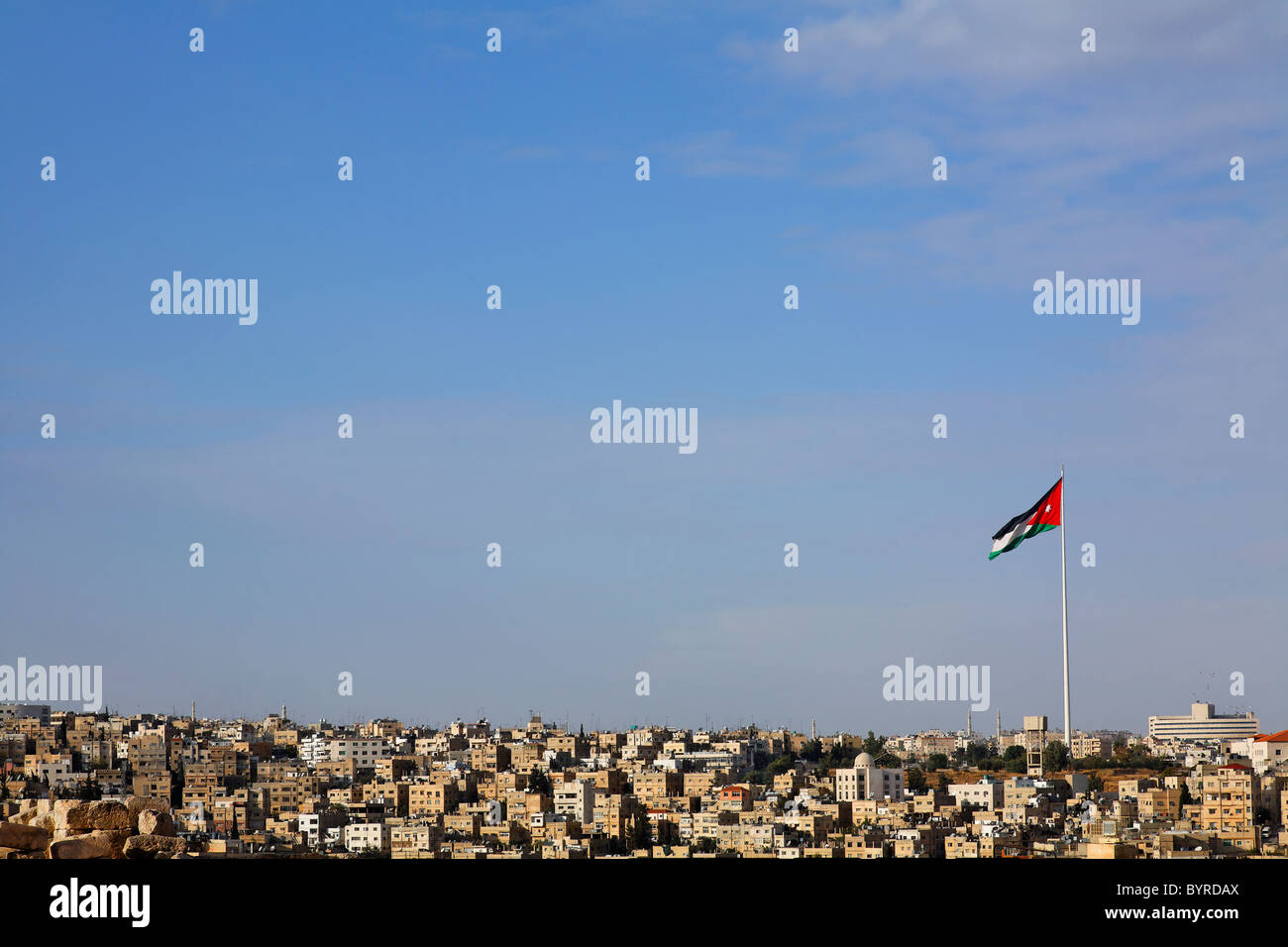 Large Jordanian flag flying over the city of Amman, Jordan Stock Photo ...