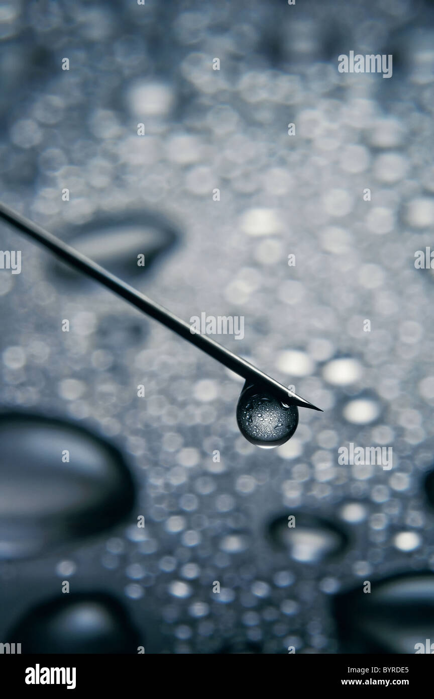 Intravenous needle and droplet macro, dramatic lighting,blue tint Stock ...