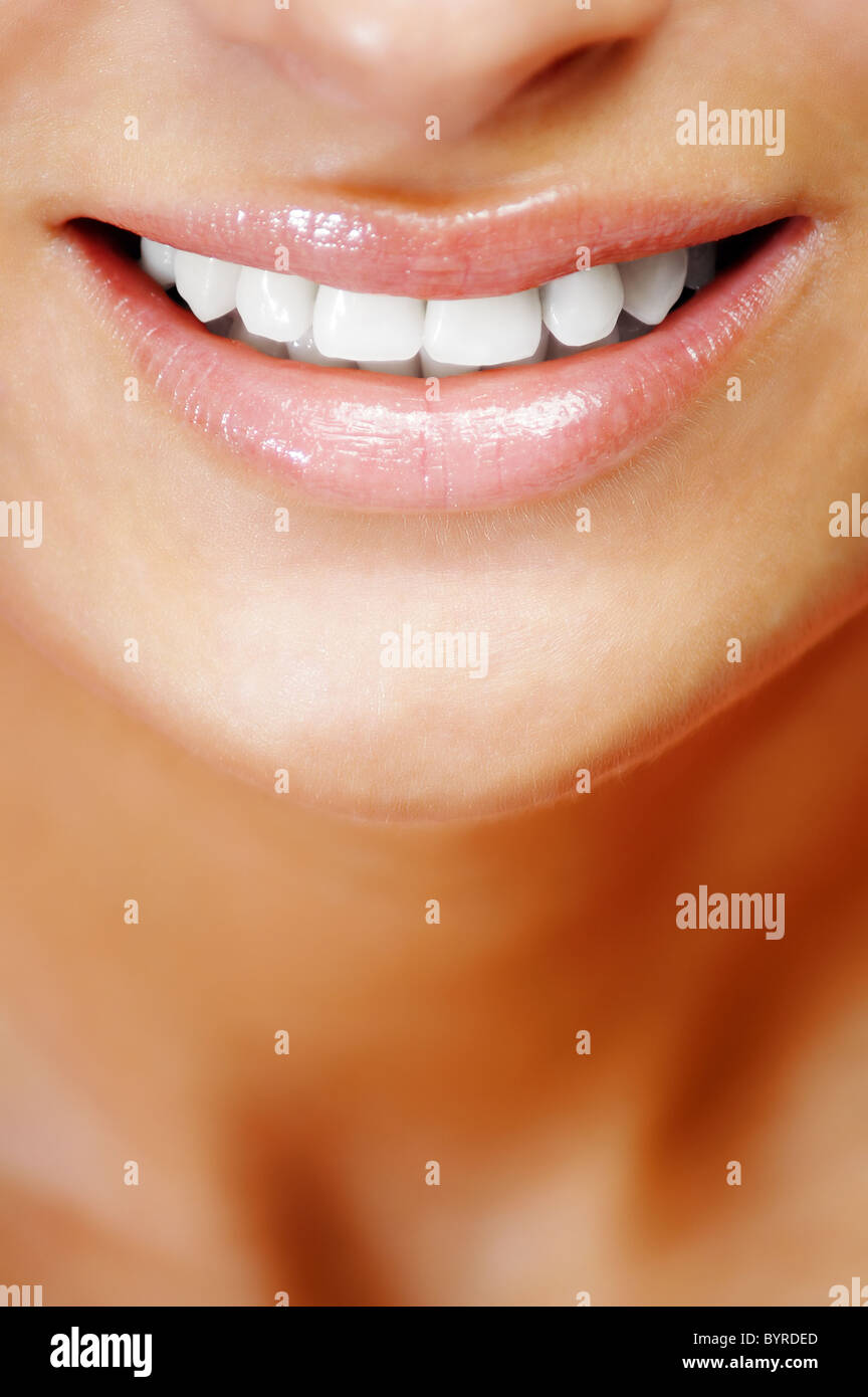Teeth of a smiling young woman ,vertical Stock Photo - Alamy