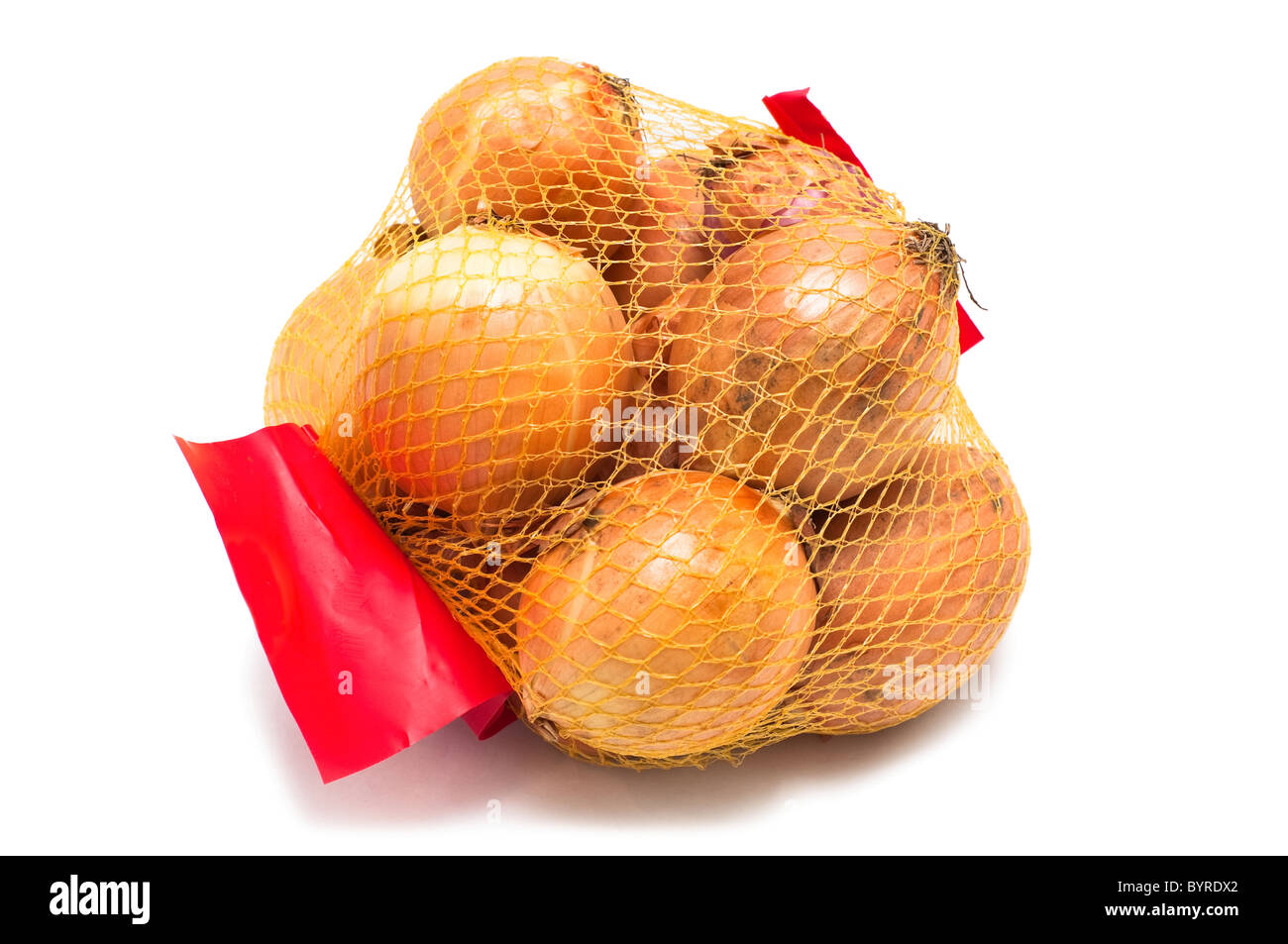 Onions packing in mesh. Isolated on white background Stock Photo - Alamy