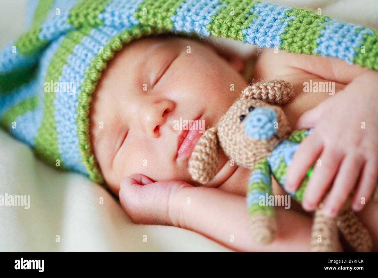 Baby with teddy hi-res stock photography and images - Alamy