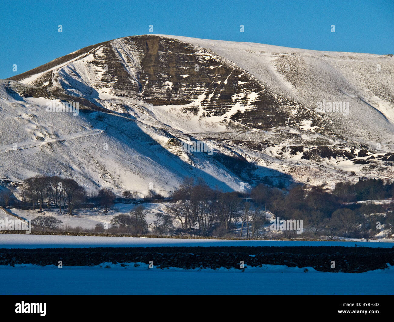 Mam Tor above the village of Castleton in the Peak District National ...