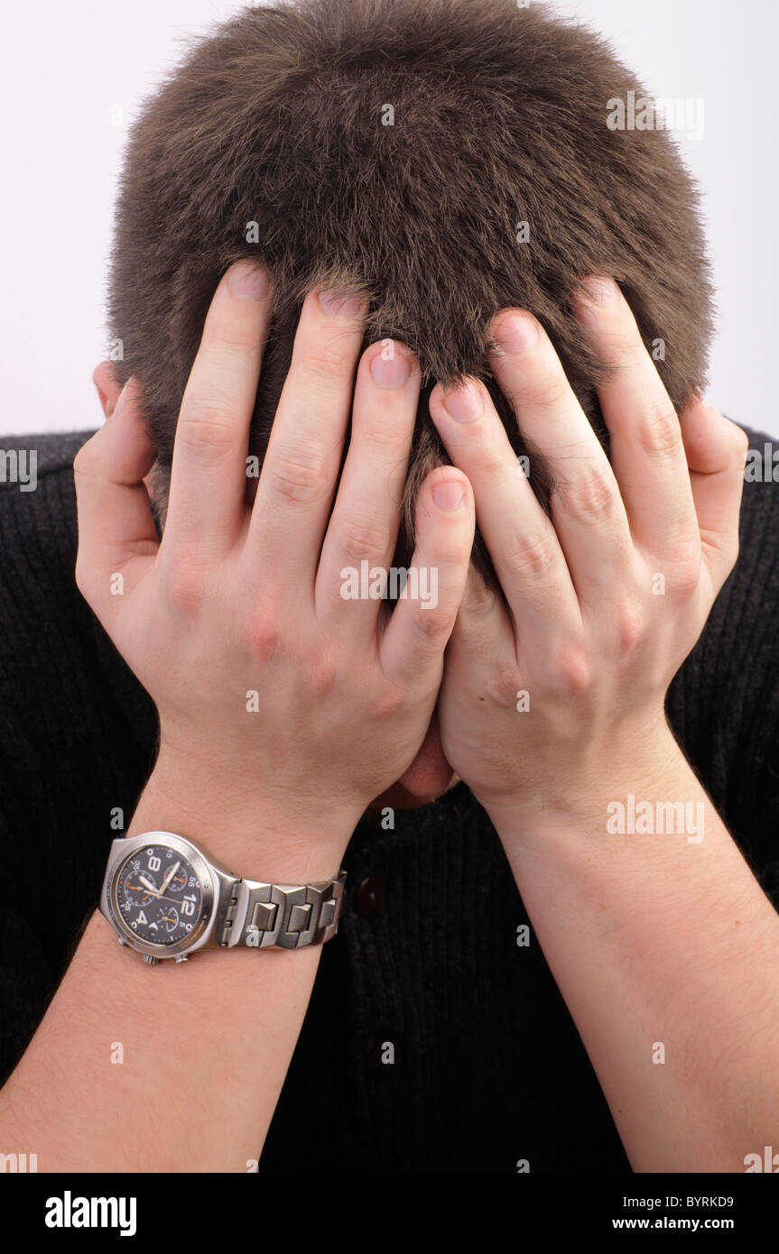 Depressed young man Stock Photo - Alamy