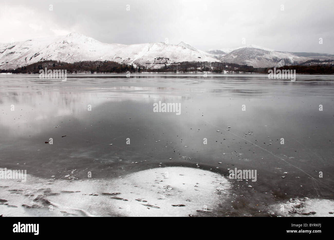 Frozen lake surface, "Derwent Water" in winter, "Lake District ...