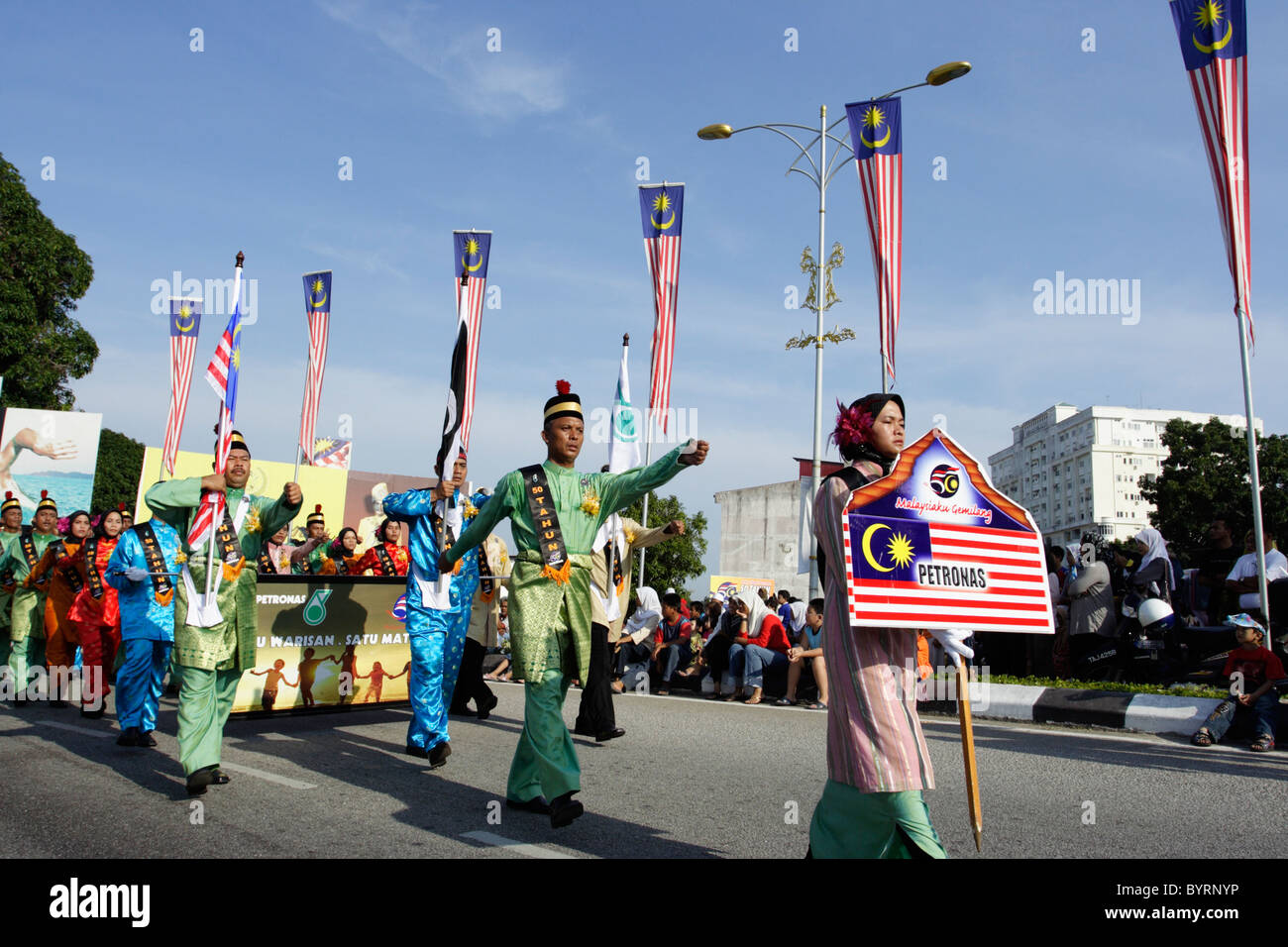 Marchers in a parade celebrating Malaysia's 50th Independence Day Stock ...