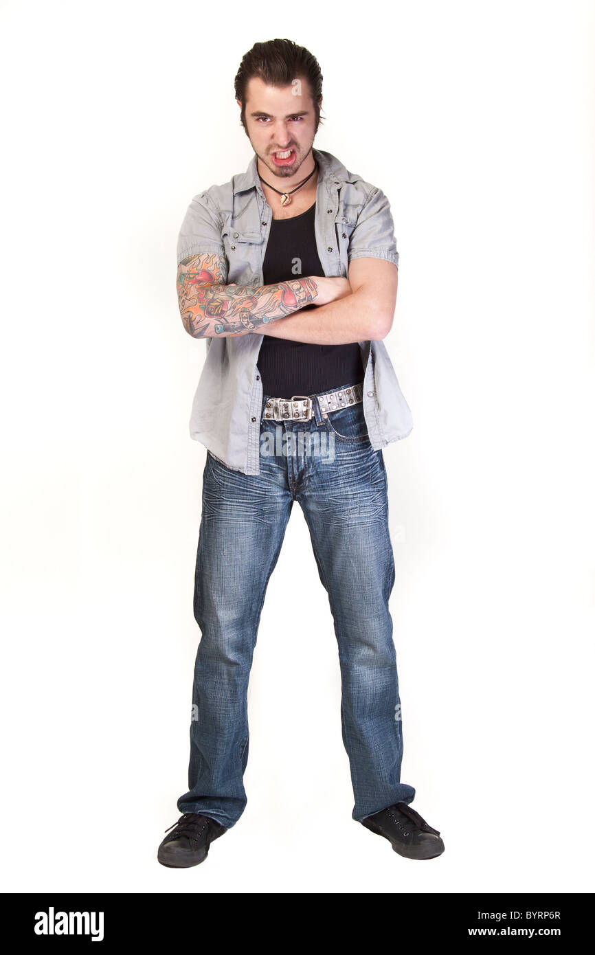 Full length picture of grunge man scowling Stock Photo - Alamy