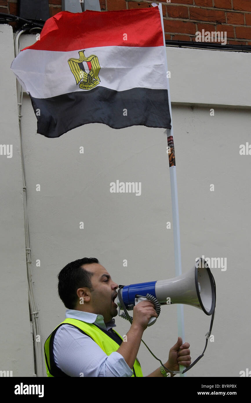 Megaphone anf flag at Egyptian Embassy protest Stock Photo - Alamy