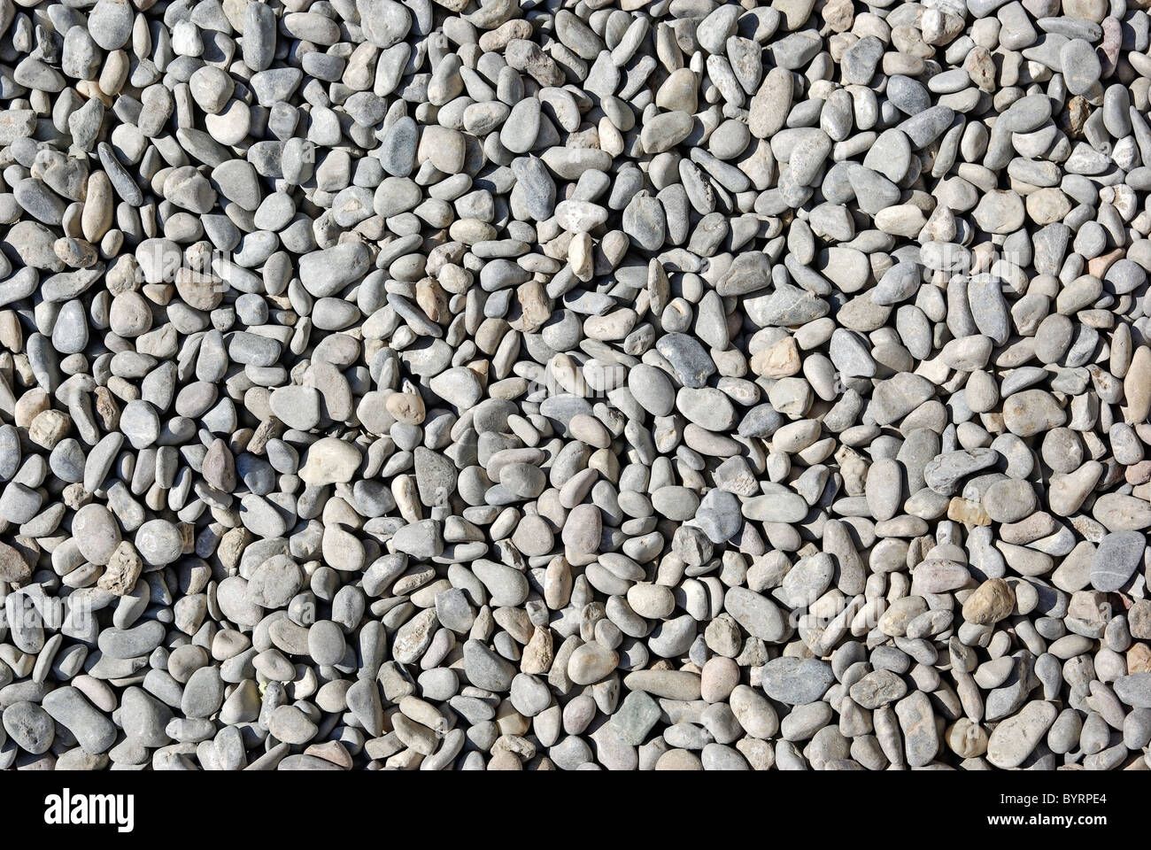 Gray small pebble as background or backdrop. Coastline of Spain Stock ...