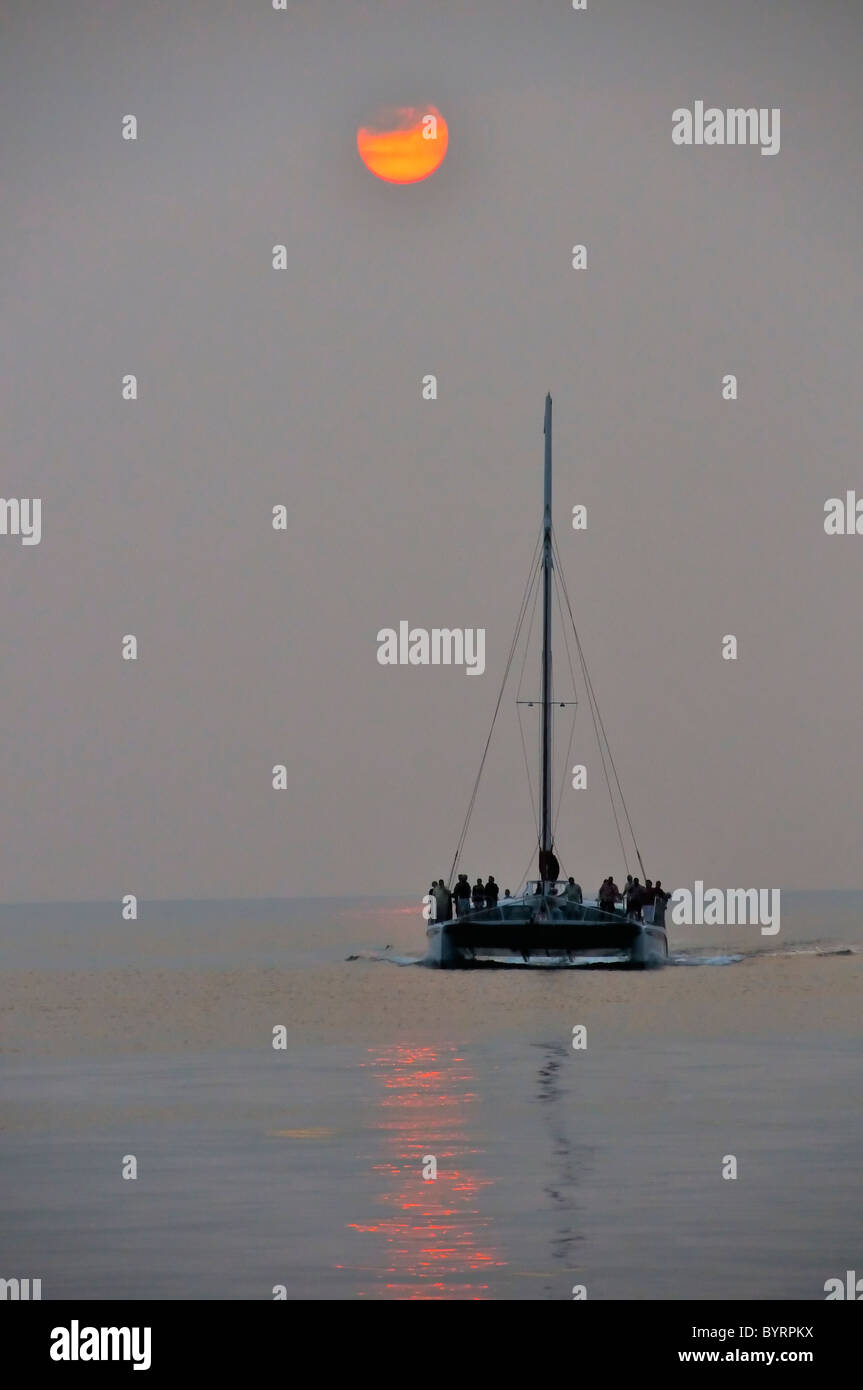 Sailboat in Fog - Volcanic Vog Hawaii Stock Photo - Alamy