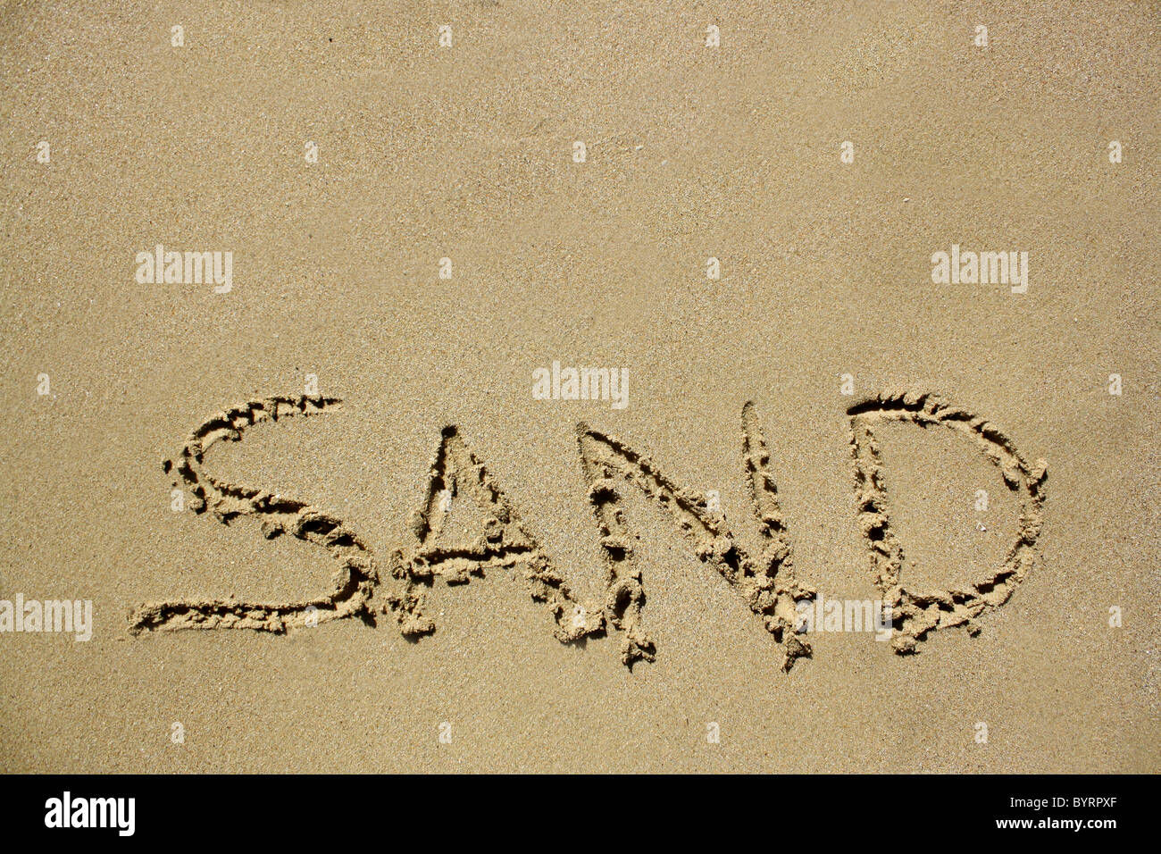 Relax written in sand wave sun hi-res stock photography and images - Alamy