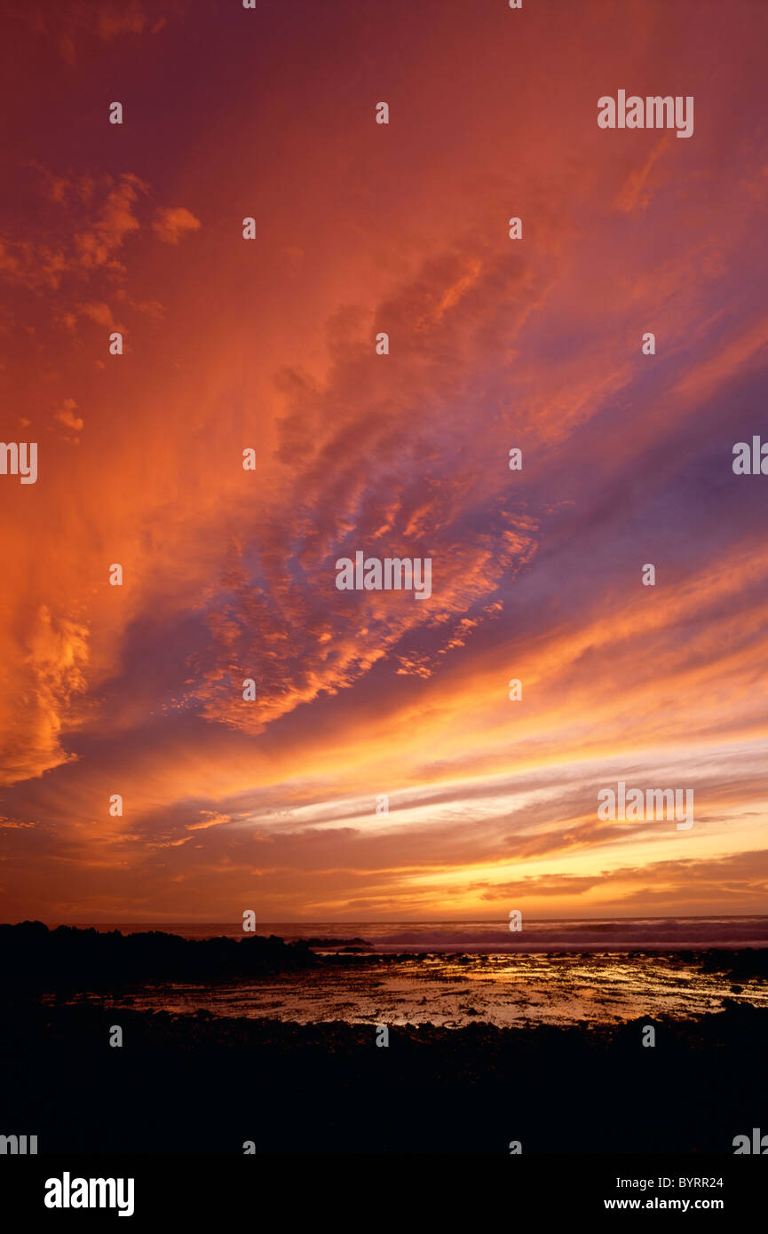 Dramatic sunset over Pacific ocean with Stratocumulus clouds along ...