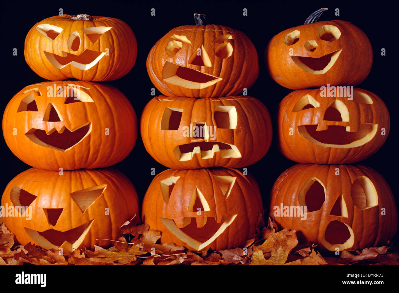 Carved pumpkins stacked on each other for Halloween scare indoors Stock ...