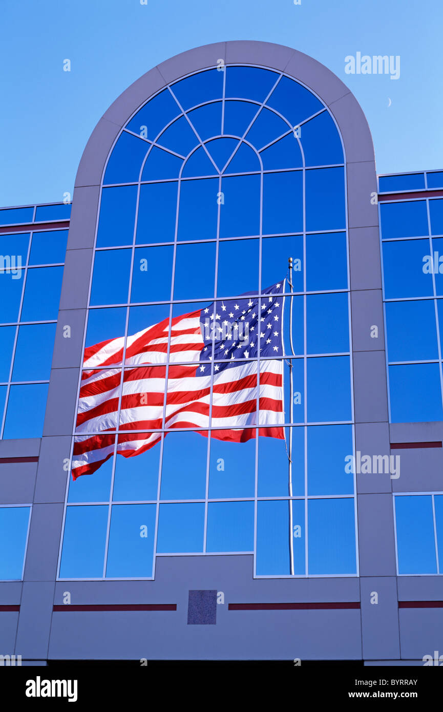 American Flag reflected in corporate building Stock Photo - Alamy