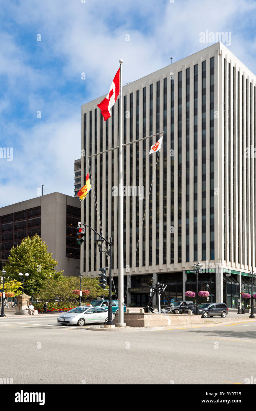 Canadian flag flying on mast outside Canada Trust bank building in ...