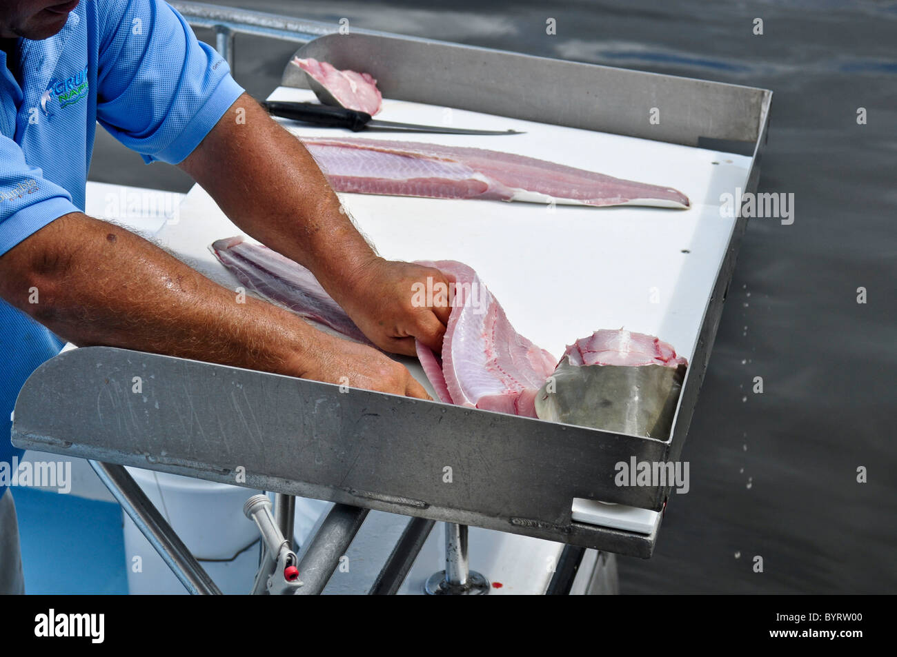 Preparing fresh fish Stock Photo - Alamy