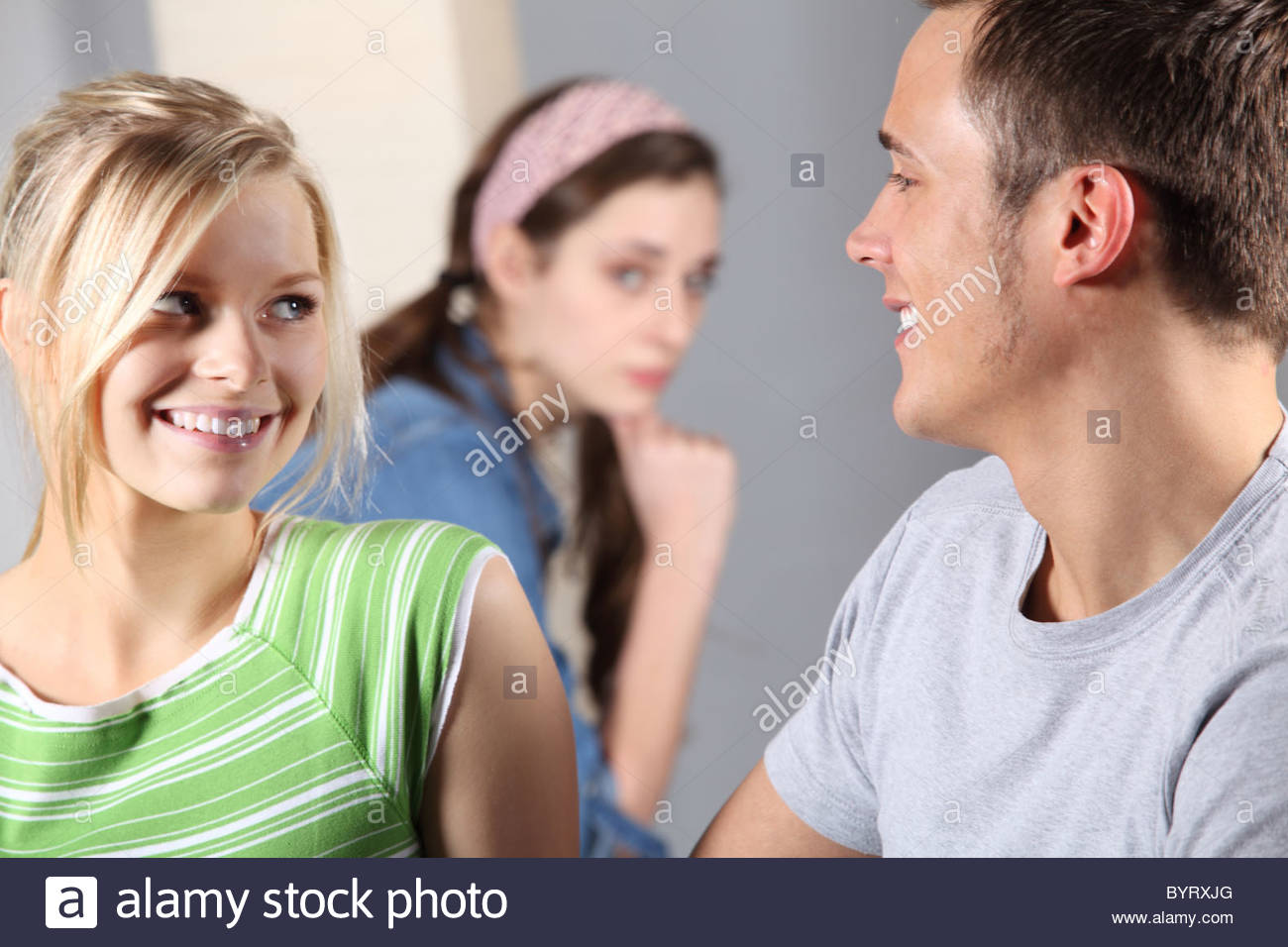 jealous woman looking at a couple Stock Photo, Royalty Free Image ...