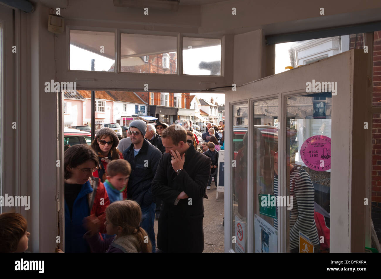 People queue outside The Golden Galleon fish and chip shop at Aldeburgh ...